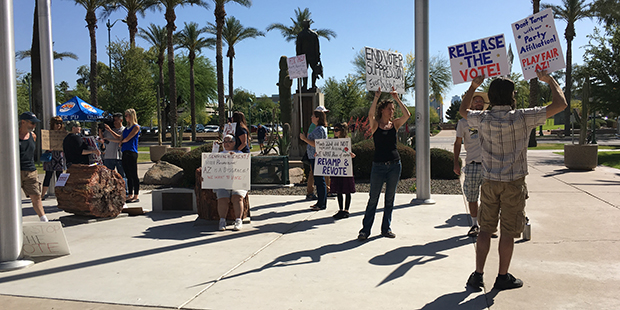 Arizonans protest presidential preference election wait times, one arrested