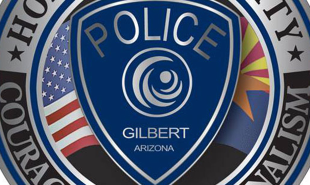 Vehicle runs red light, hits Gilbert police car Saturday morning