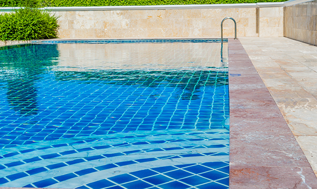 Building a pool? Here are the pros, cons to different types of surfaces