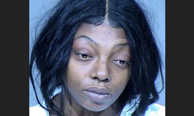 Phoenix mother accused of shooting 13-year-old son by accident