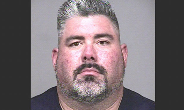 Father accused of shooting into family's car, wounding son in Scottsdale