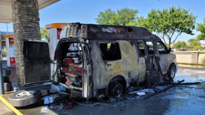 Van destroyed after catching fire at Mesa gas station
