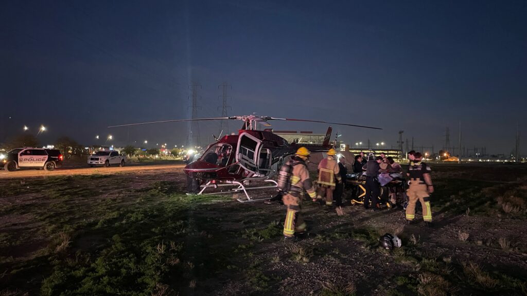 Helicopter carrying 1 medical patient lands on a field in Tempe